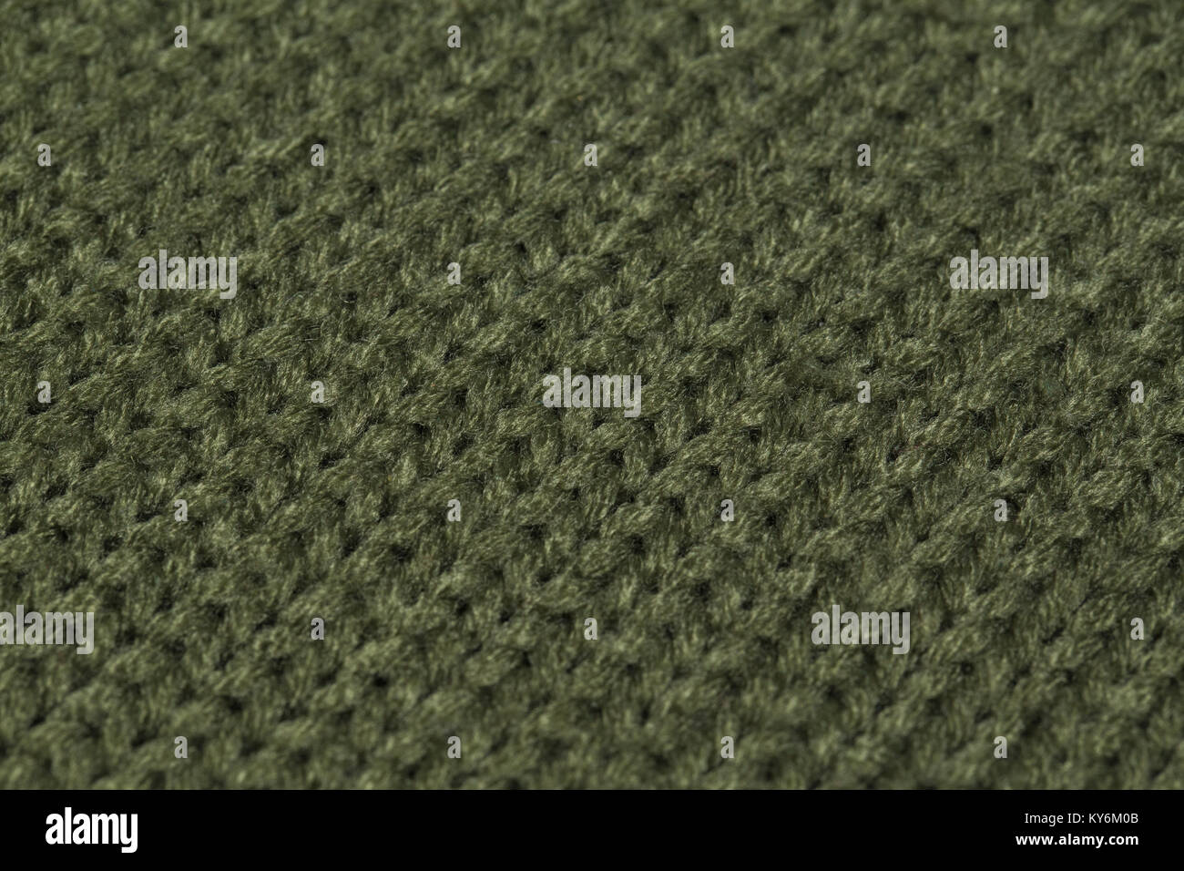 Macro color image of green knitted texture Stock Photo - Alamy