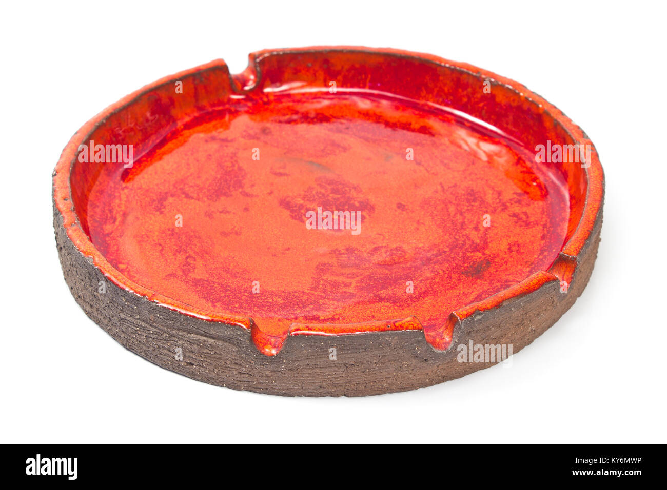 Red ceramic ashtray isolated on white background Stock Photo - Alamy