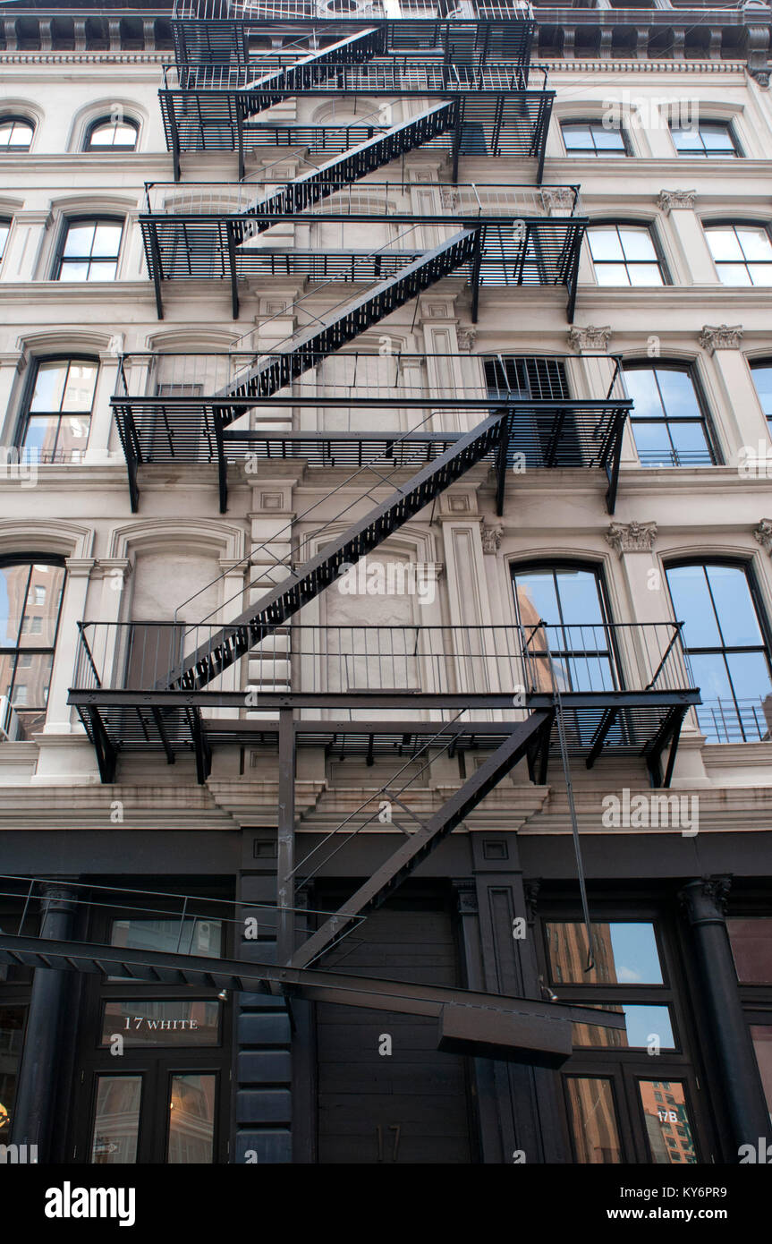 Facade of a building with emergency stairs with handrail, ladders fire ...