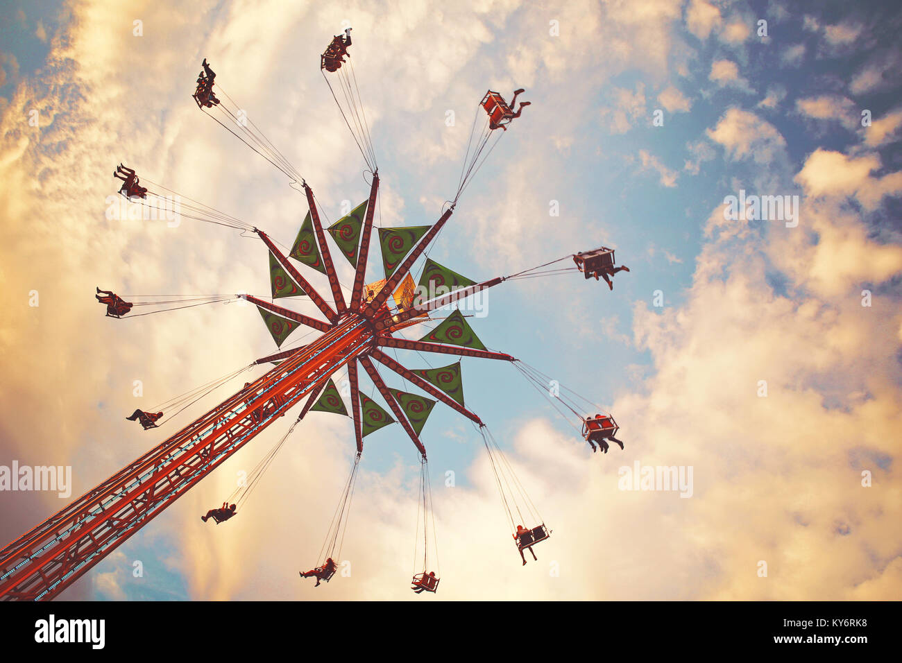 Swinging fair ride dusk toned hi-res stock photography and images - Alamy