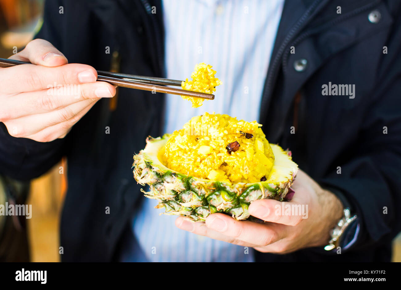 Man eating rice hi-res stock photography and images - Alamy