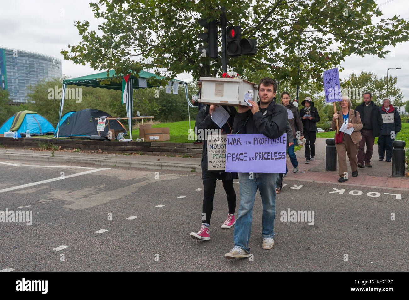 Mock funeral procession by London Catholic Workers for victims of the ...