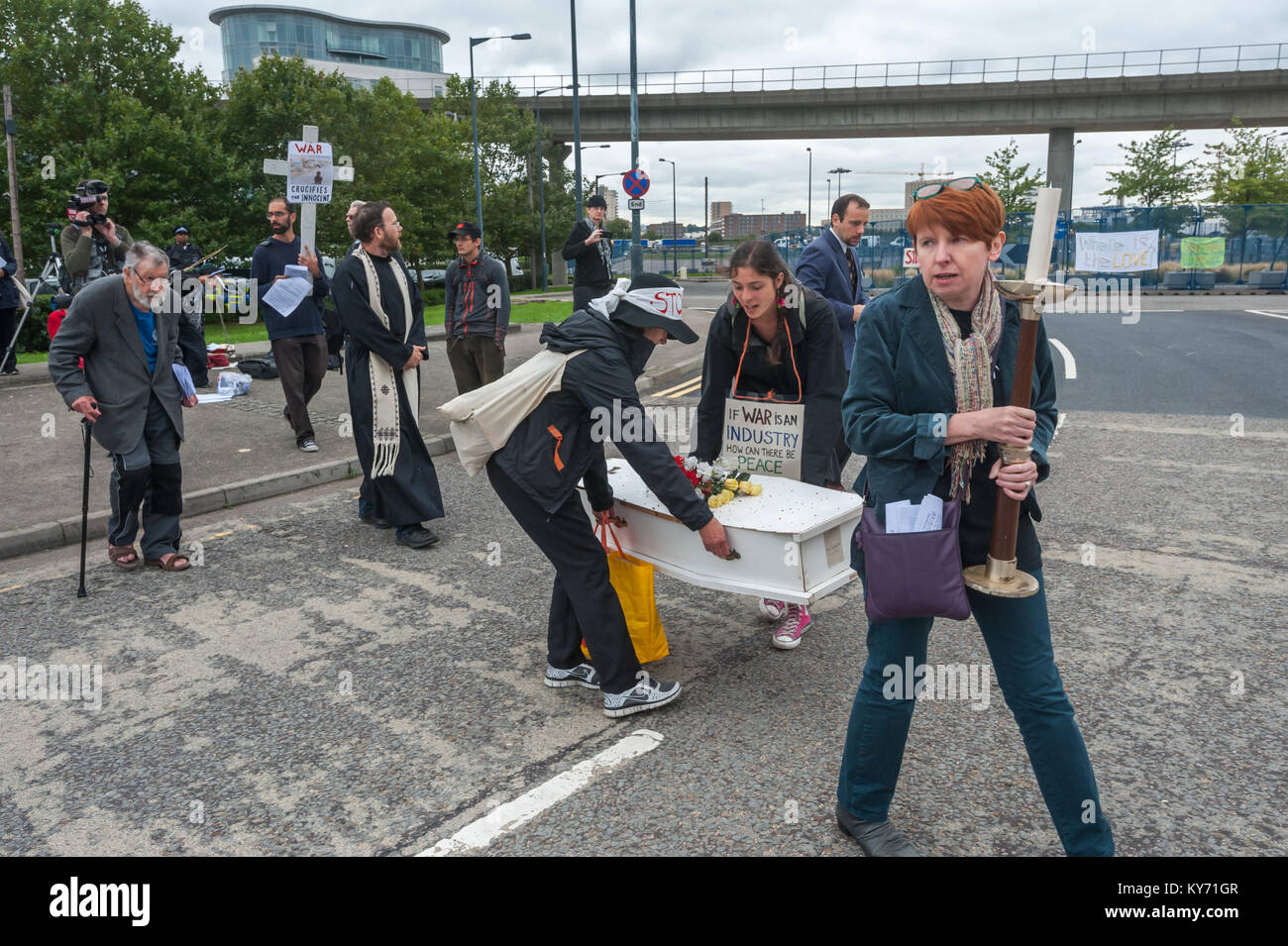 At the end of the mock funeral by London Catholic Workers for victims ...