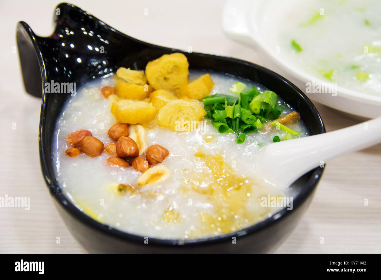 Chinese famous Tingzai rice porridge served in a restaurant Stock Photo ...