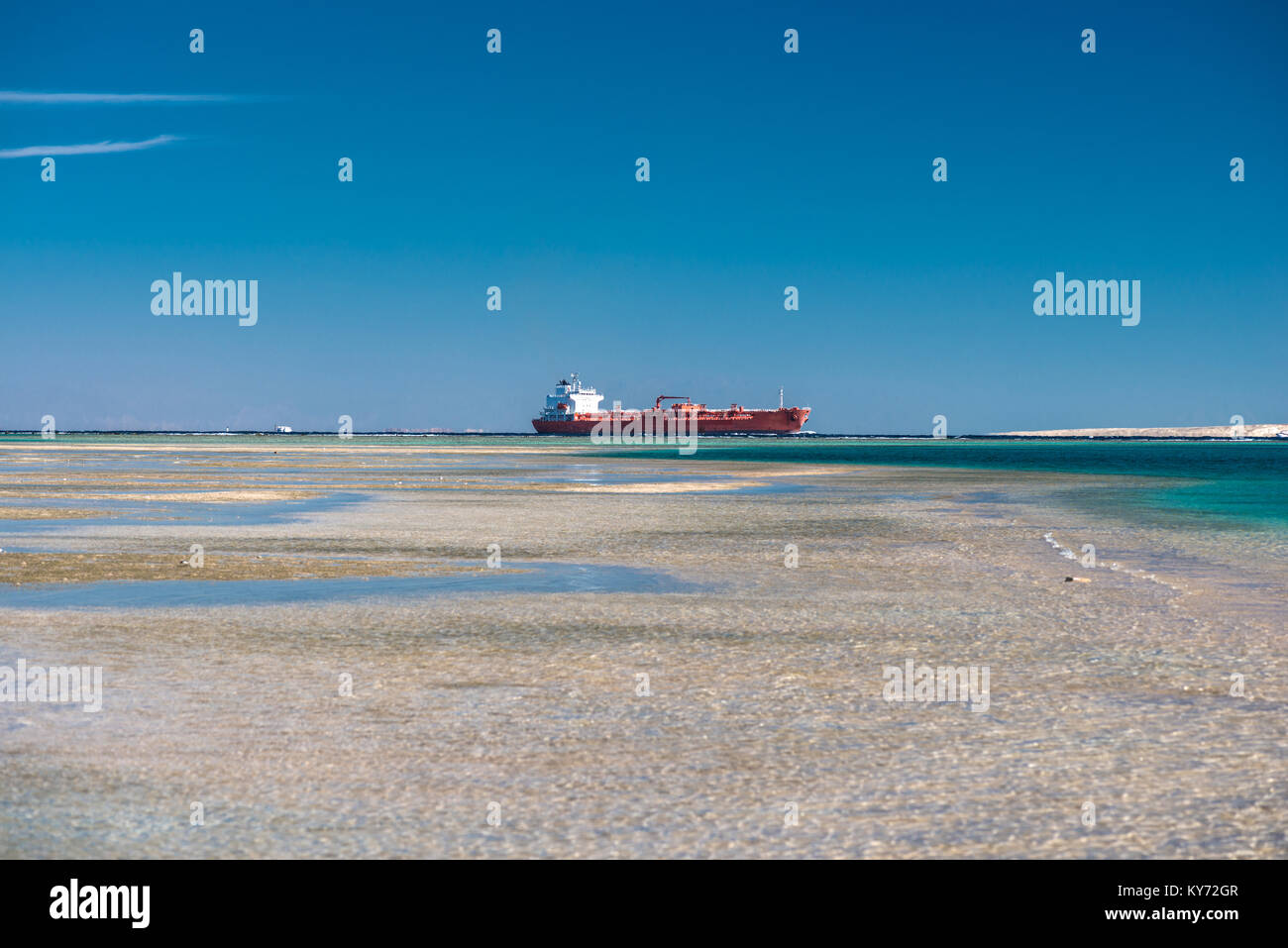 Red cargo ship sailing in Red Sea Stock Photo - Alamy