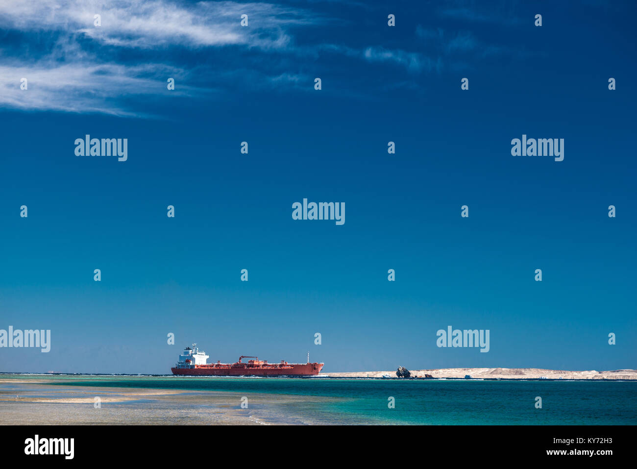 Red cargo ship sailing in Red Sea Stock Photo - Alamy