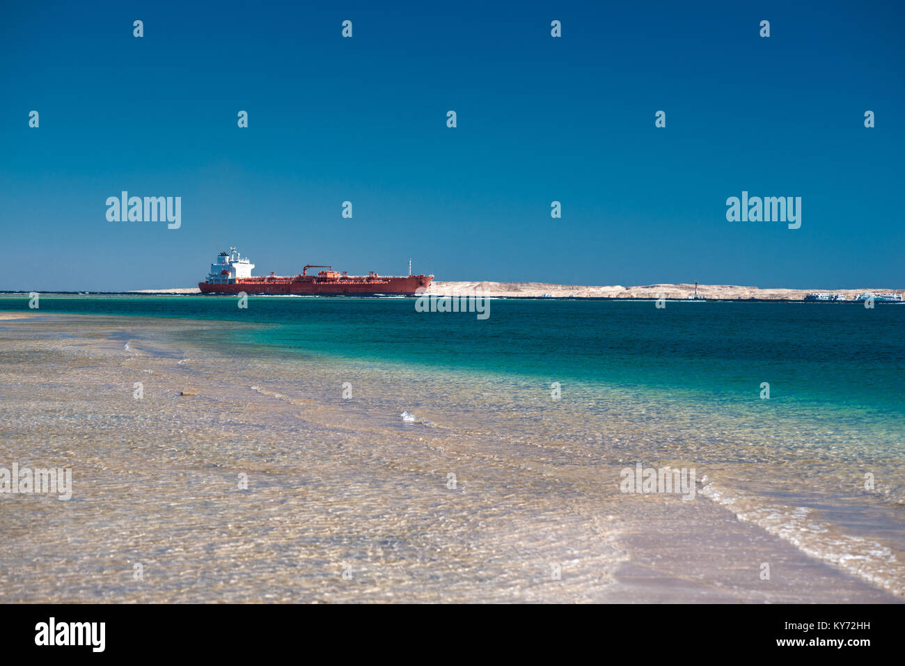 Red cargo ship sailing in the Red Sea Stock Photo - Alamy