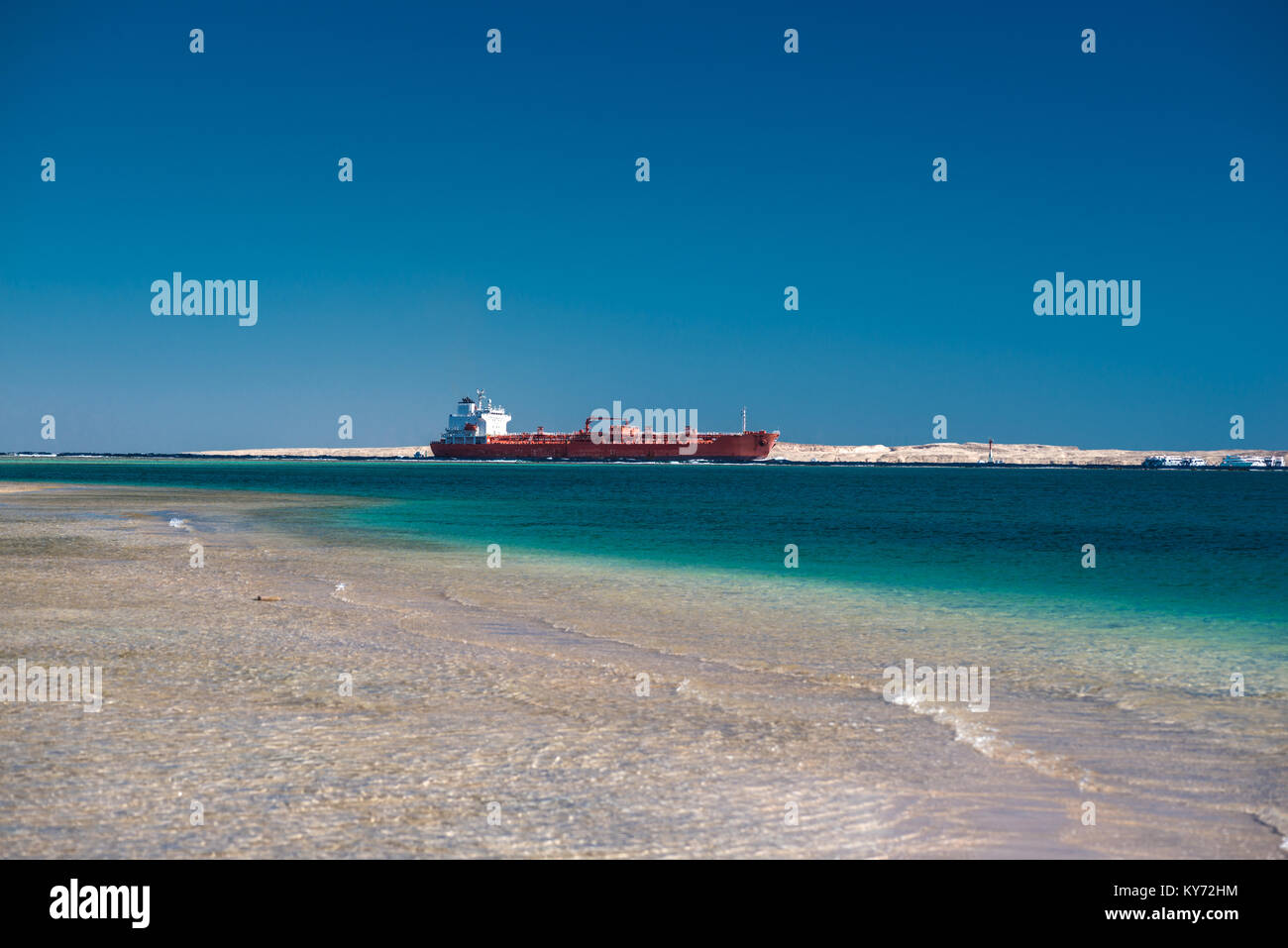 Red cargo ship sailing in Red Sea Stock Photo - Alamy