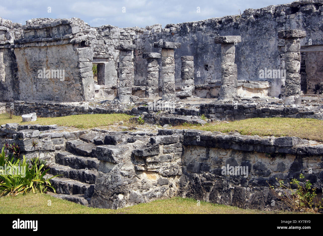 Columns and walls of ruined temple in Tulum, Mexico Stock Photo - Alamy