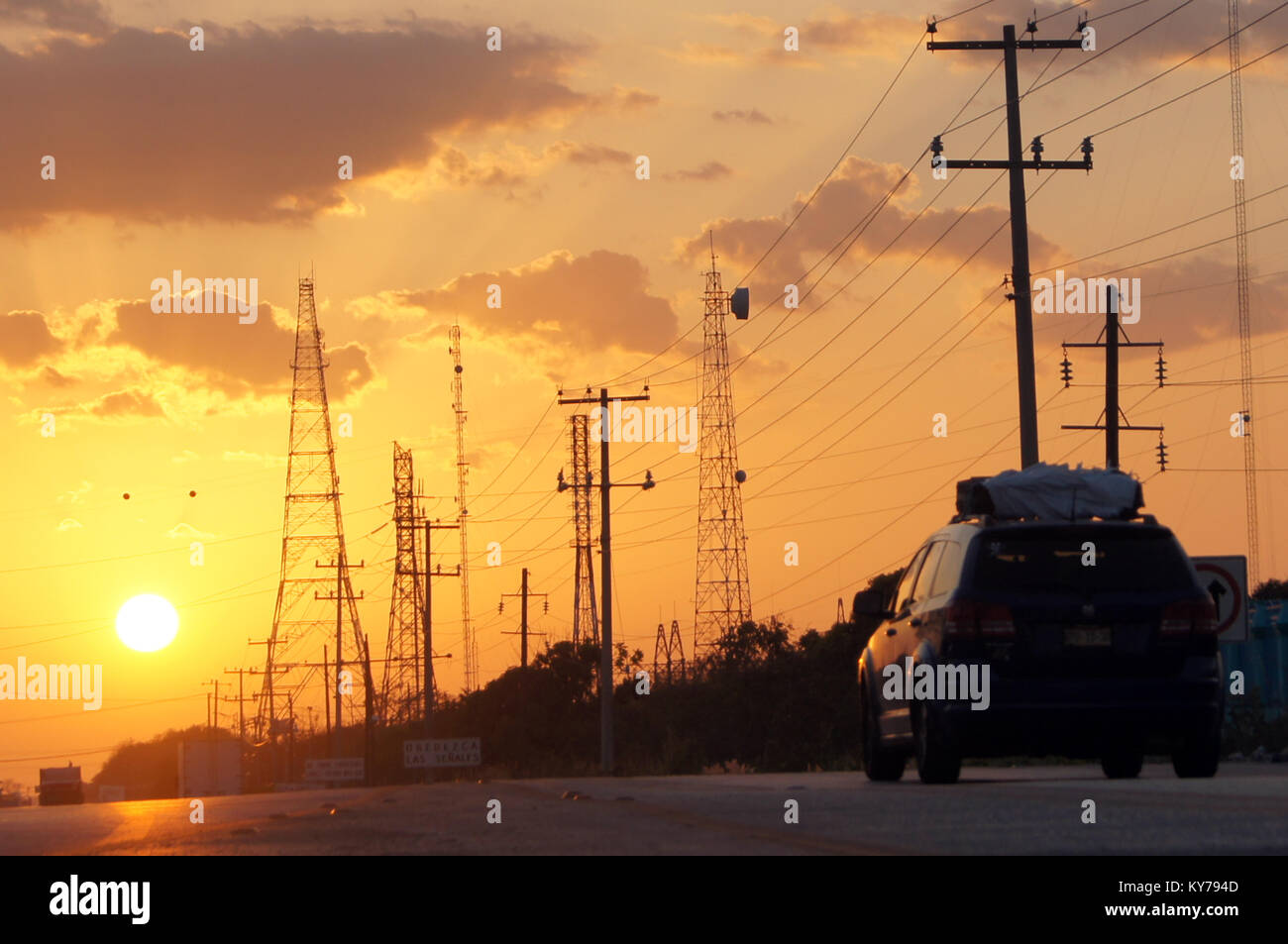 Car on the road and sunsrt in Mexico Stock Photo - Alamy
