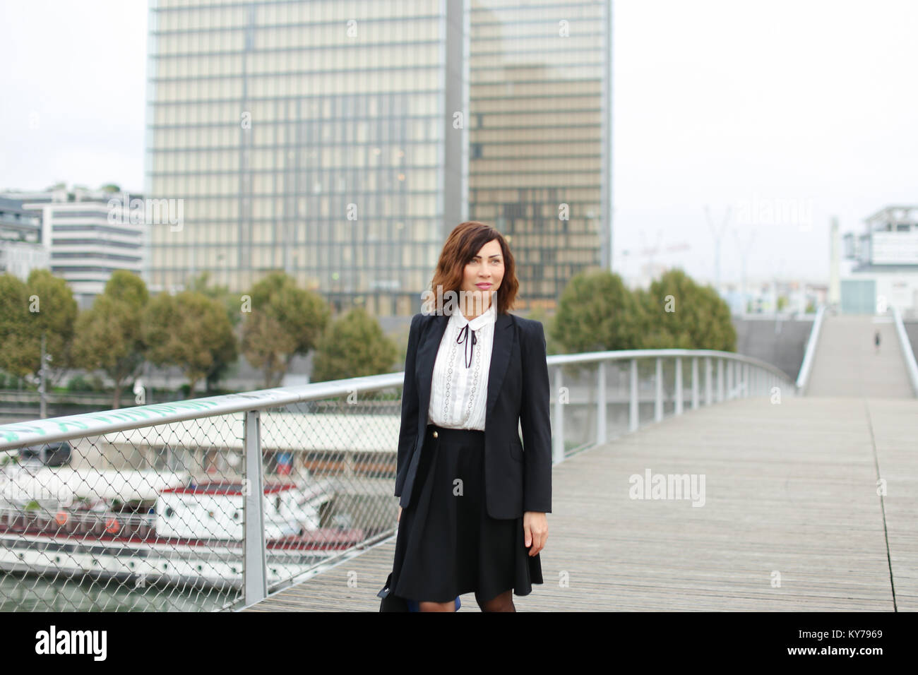 journalist, woman in business clothes go to work. Smiling middle-aged ...