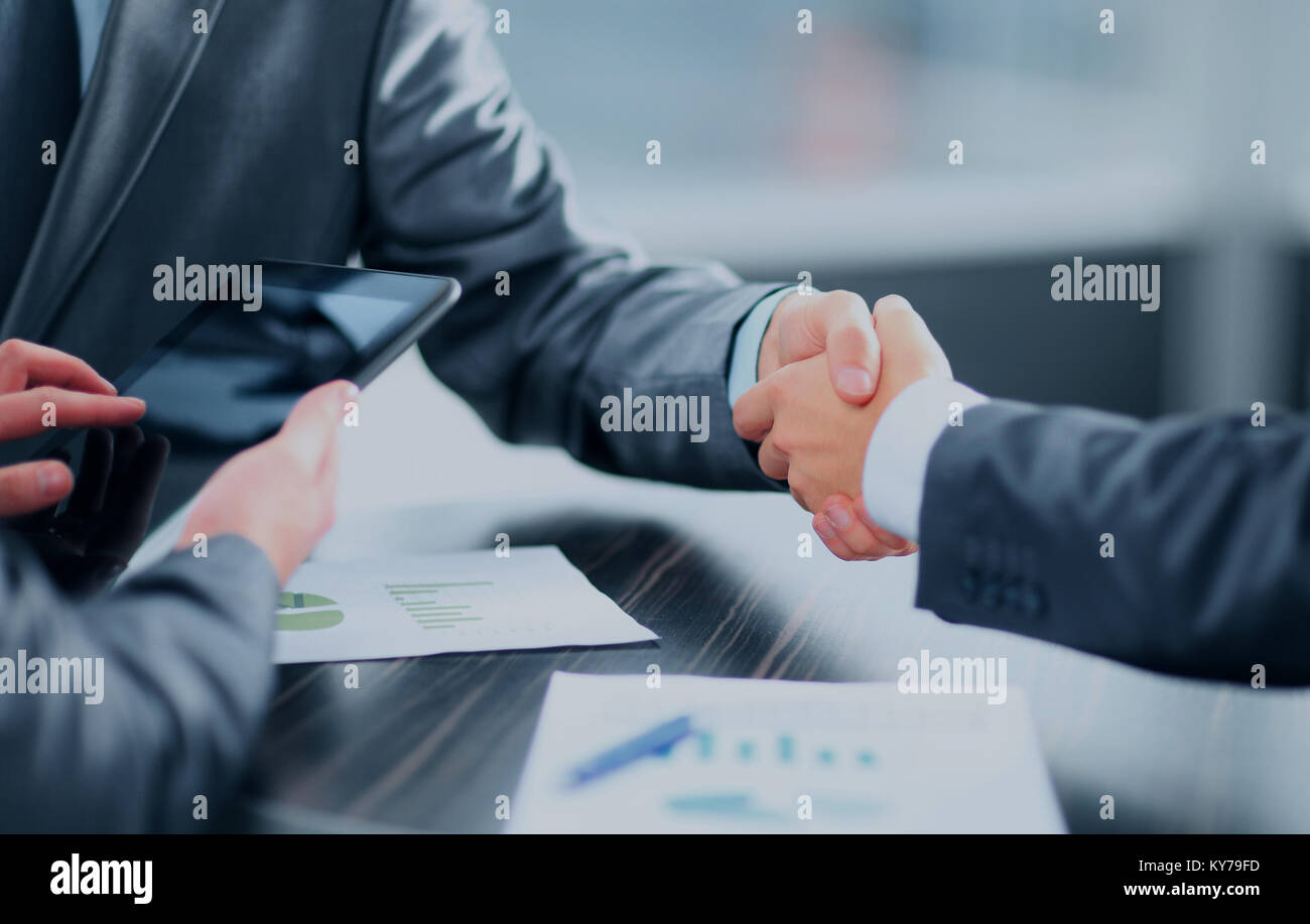 Business people shaking hands in office Stock Photo - Alamy
