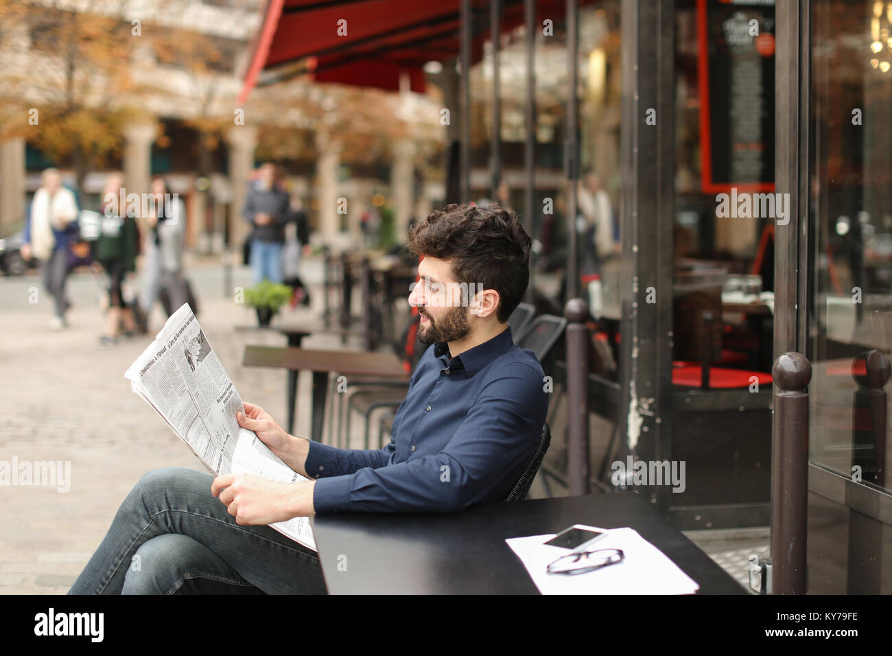 journalist enjoying with reading newspaper columns and articles with ...