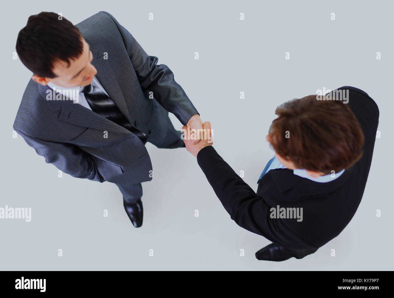 handshake isolated on white background top view Stock Photo - Alamy