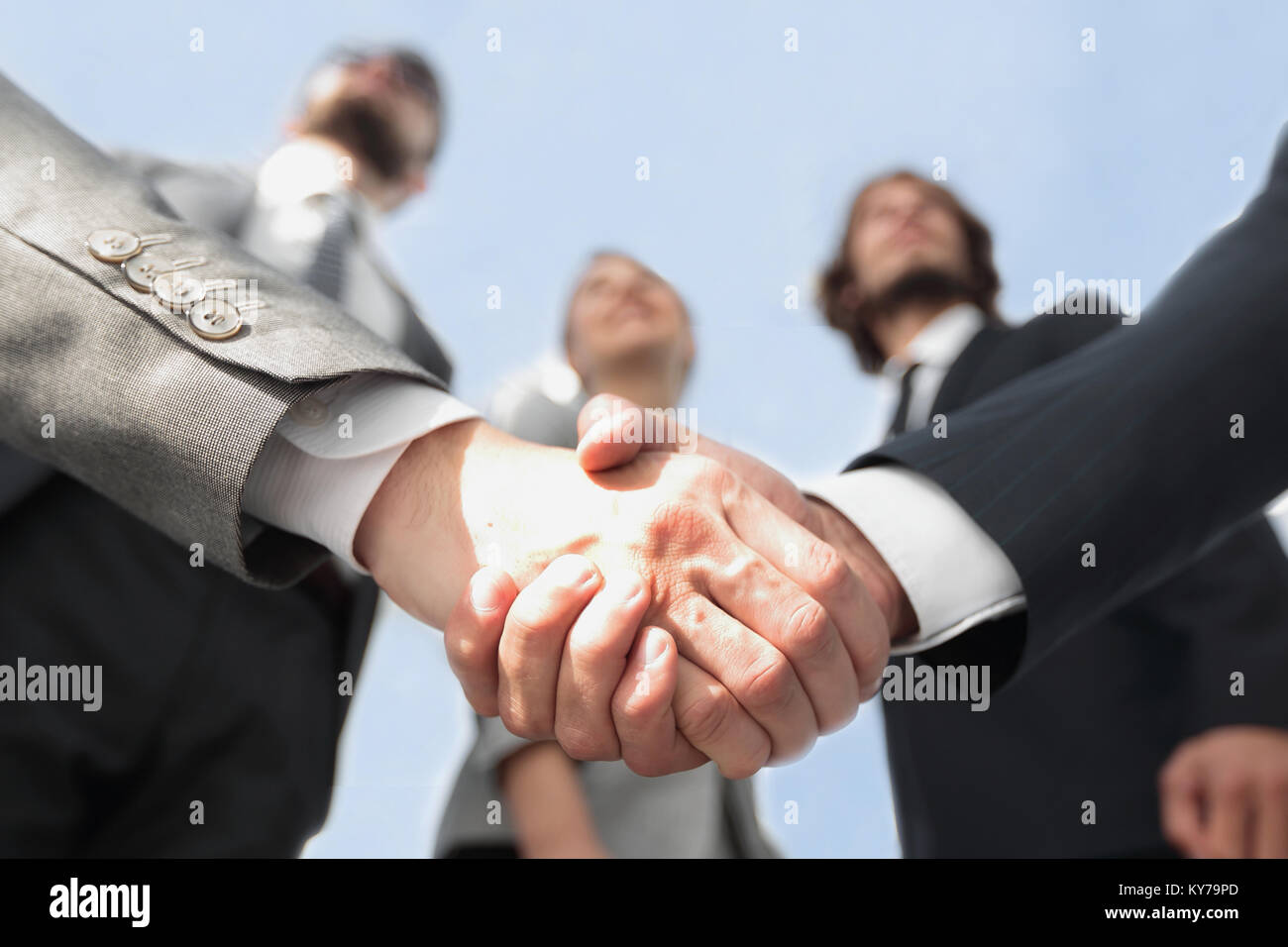 in the foreground.handshake of business partners Stock Photo - Alamy