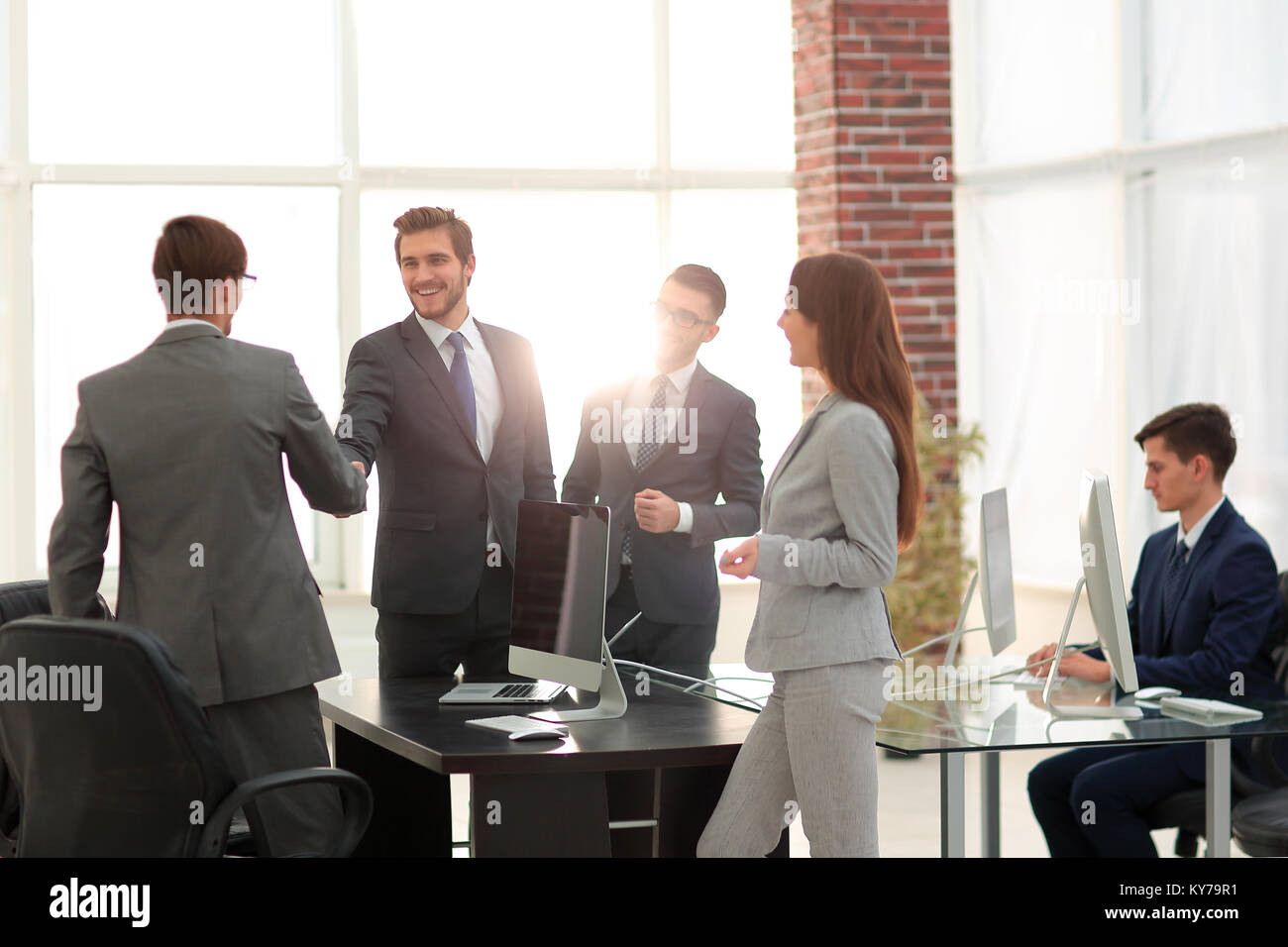Business group of five people in the office planning a job Stock Photo ...