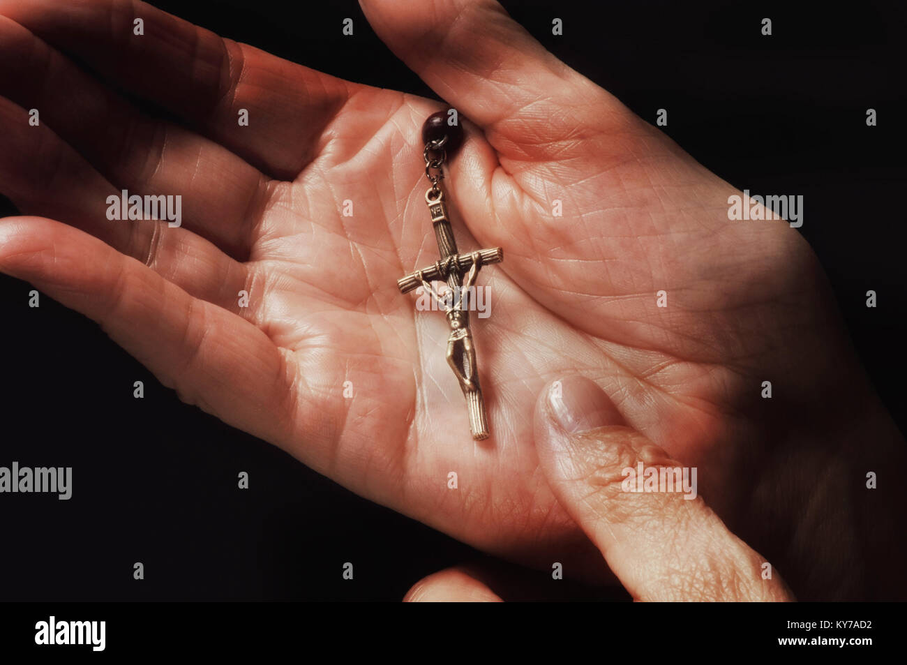Crucifix hand hi-res stock photography and images - Alamy