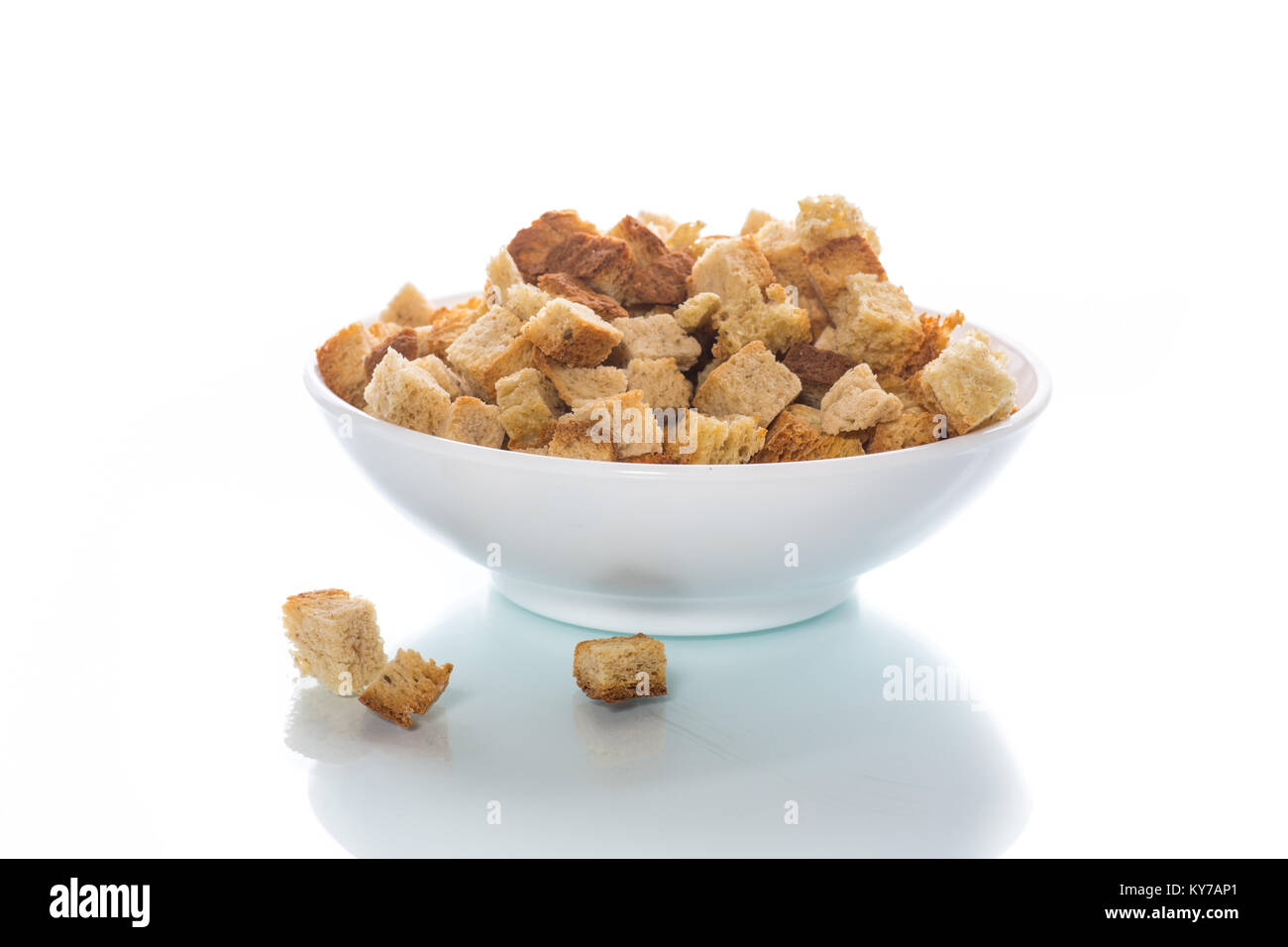 fried bread crumbs on a white background Stock Photo - Alamy