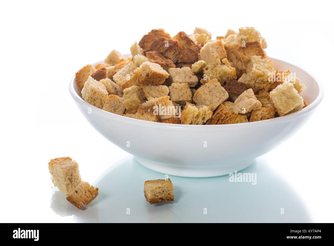fried bread crumbs on a white background Stock Photo - Alamy