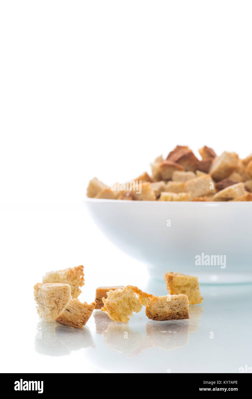 fried bread crumbs on a white background Stock Photo - Alamy