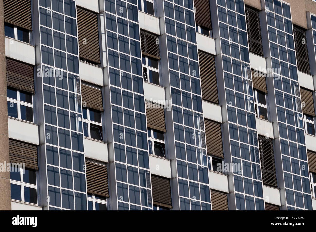 Background image of a facade from a building with small windows Stock ...