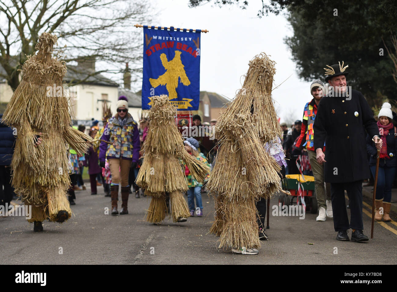 People in Straw Bear costumes are led through Whittlesey in ...