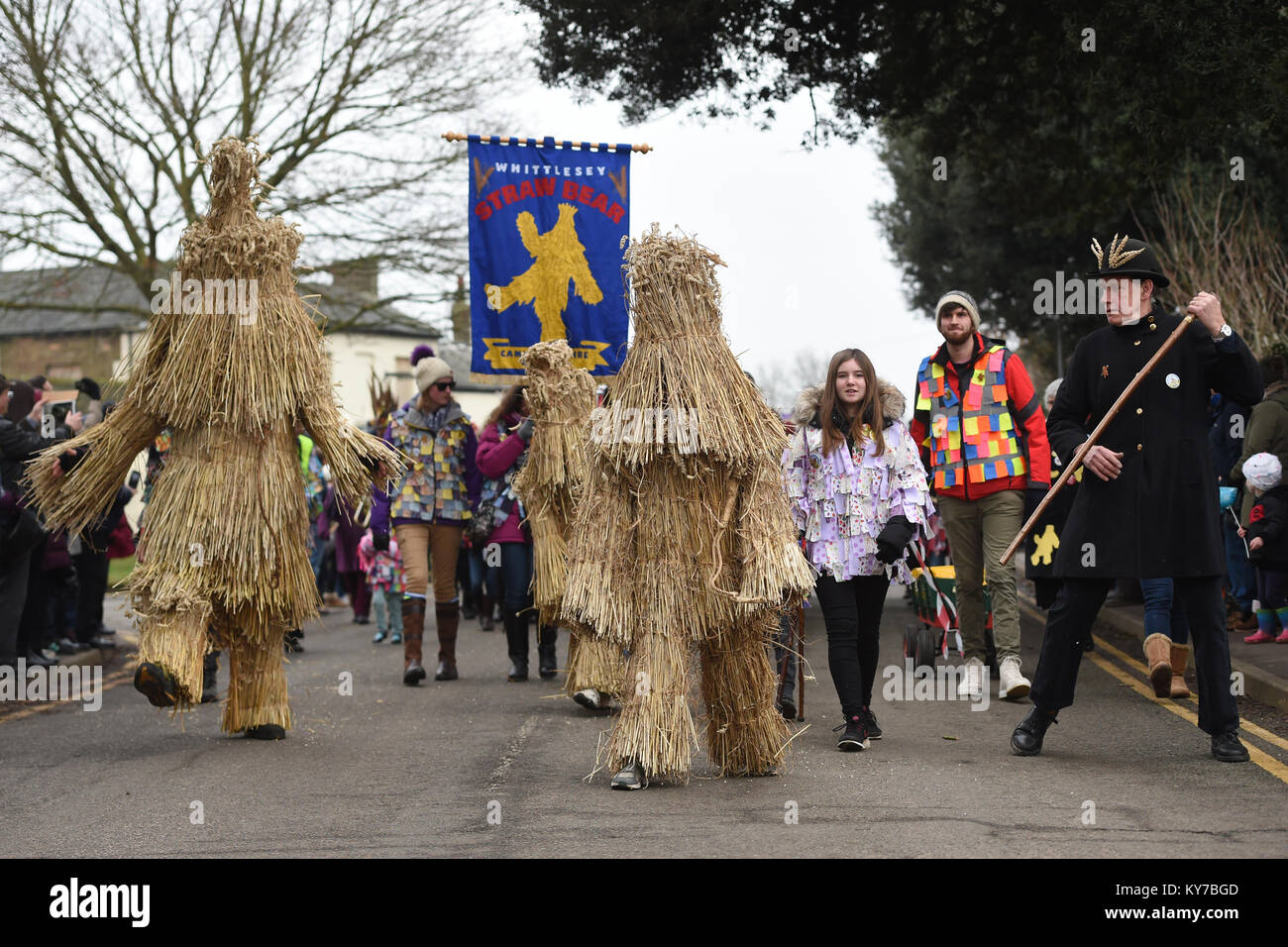 People in Straw Bear costumes are led through Whittlesey in ...