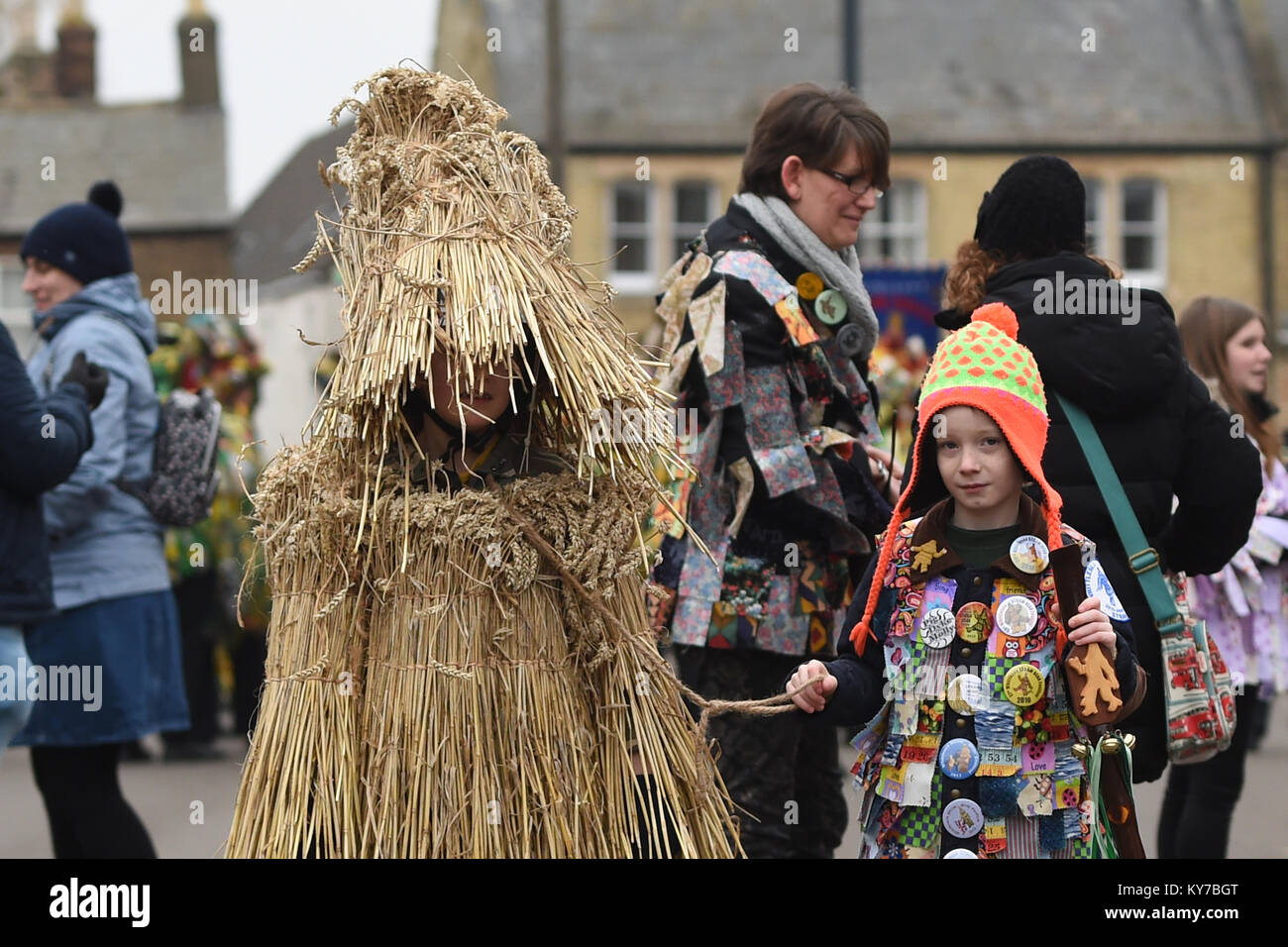 People in Straw Bear costumes are led through Whittlesey in ...