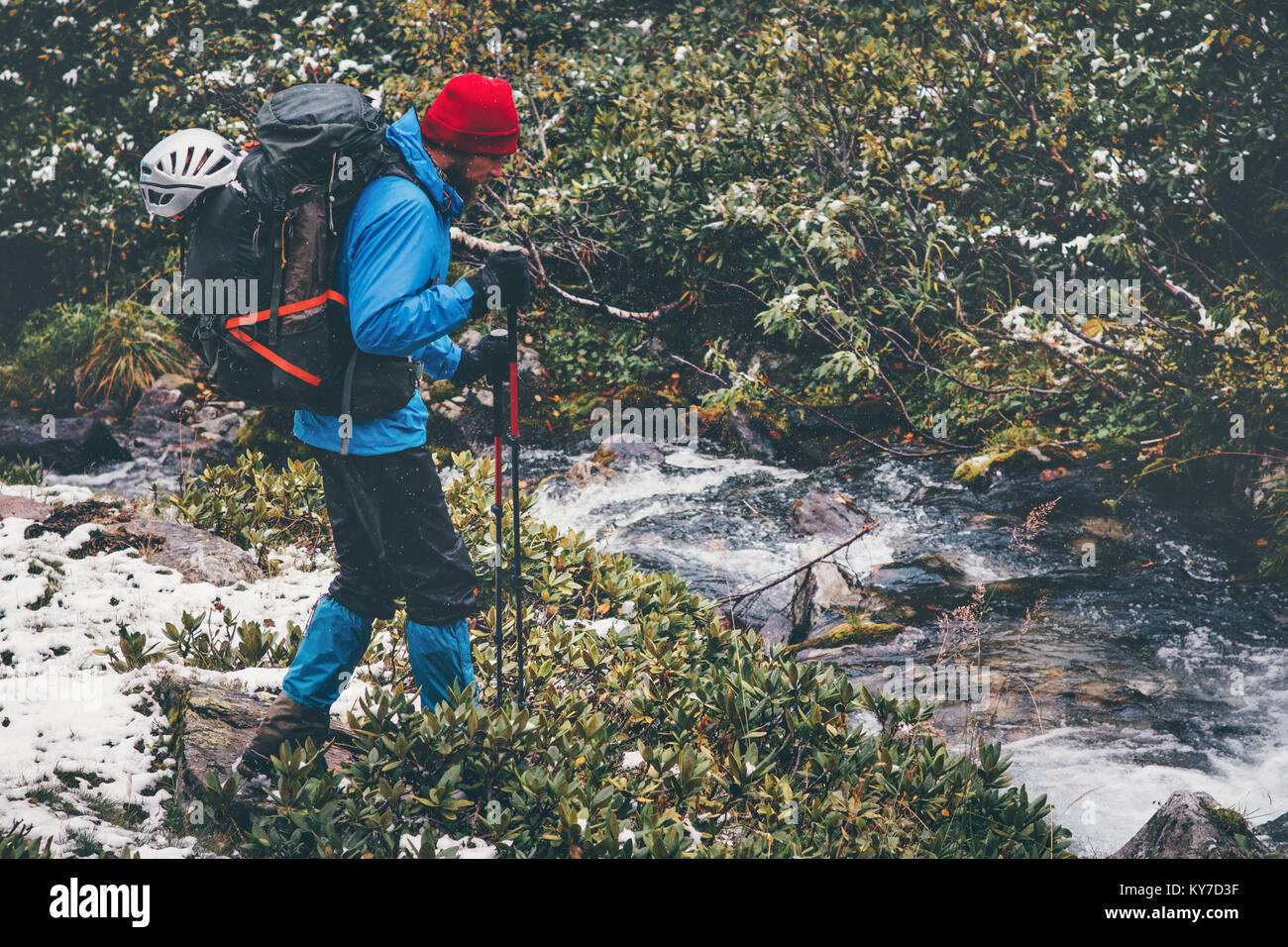 Traveler Man hiking alone in forest with big backpack Travel Lifestyle ...