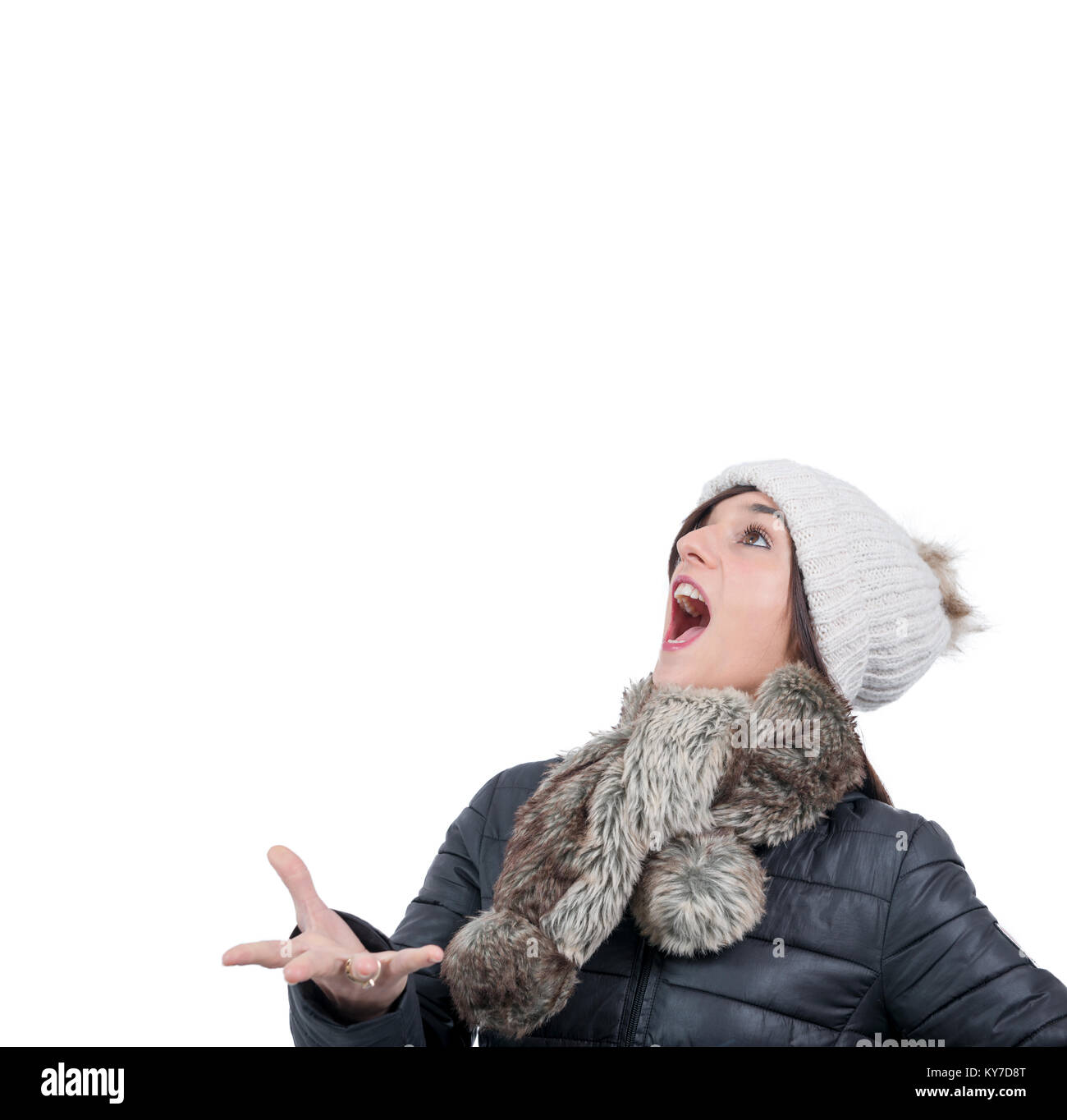 A woman throwing something in the air, isolated on the white background ...
