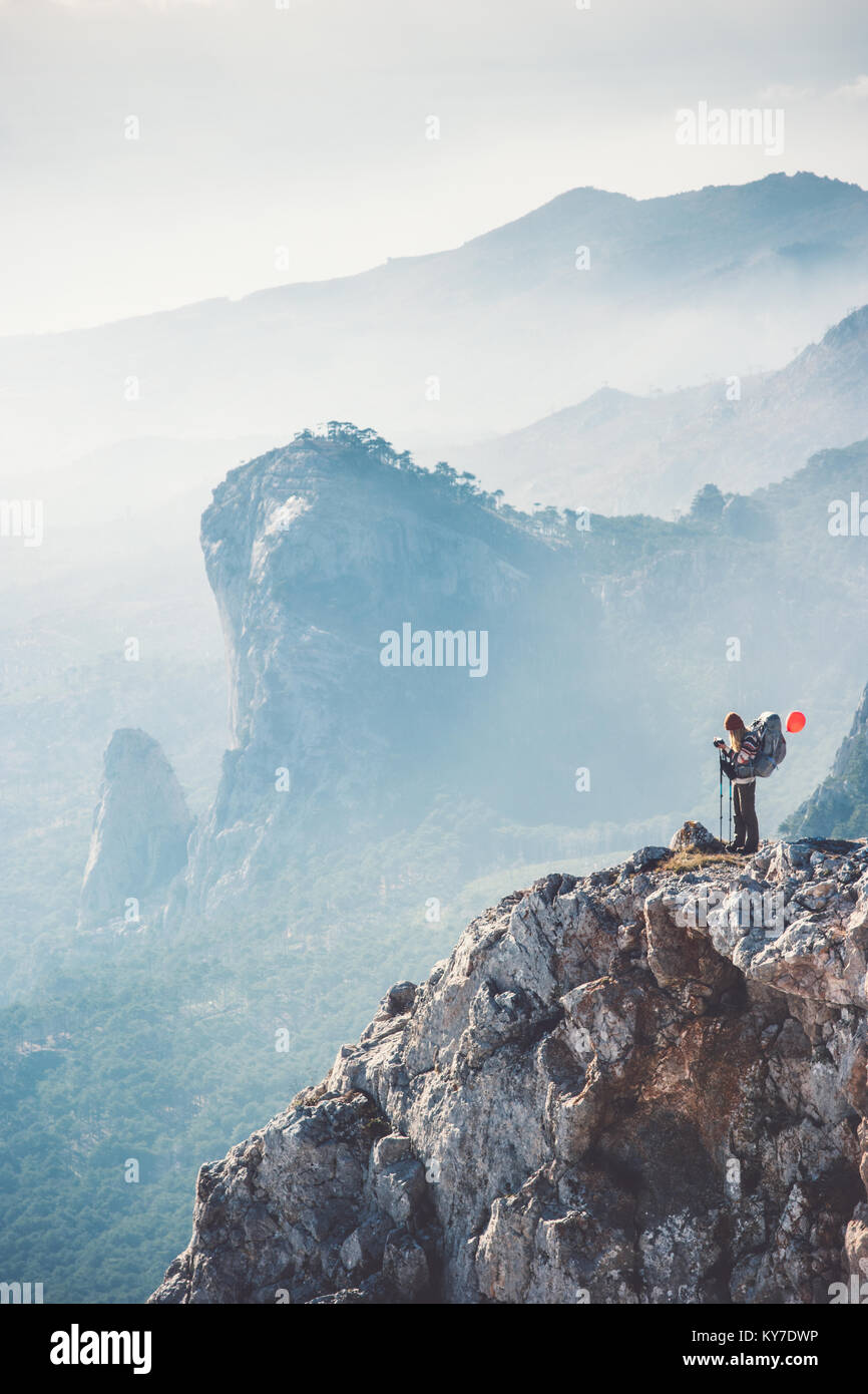 Traveler backpacker on mountains cliff hiking enjoy landscape Travel ...