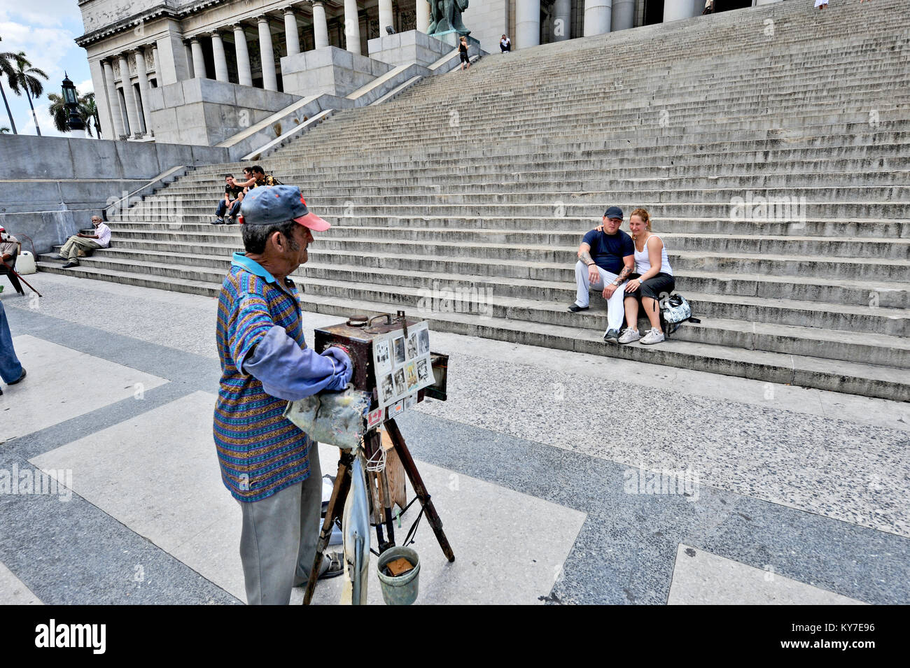 HAVANA, CUBA, MAY 11, 2009. A man with an old box camera in front of El ...