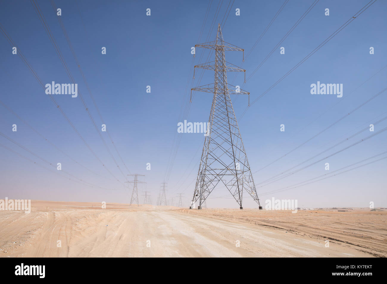Electricity power lines in the desert. Abu Dhabi, UAE Stock Photo - Alamy