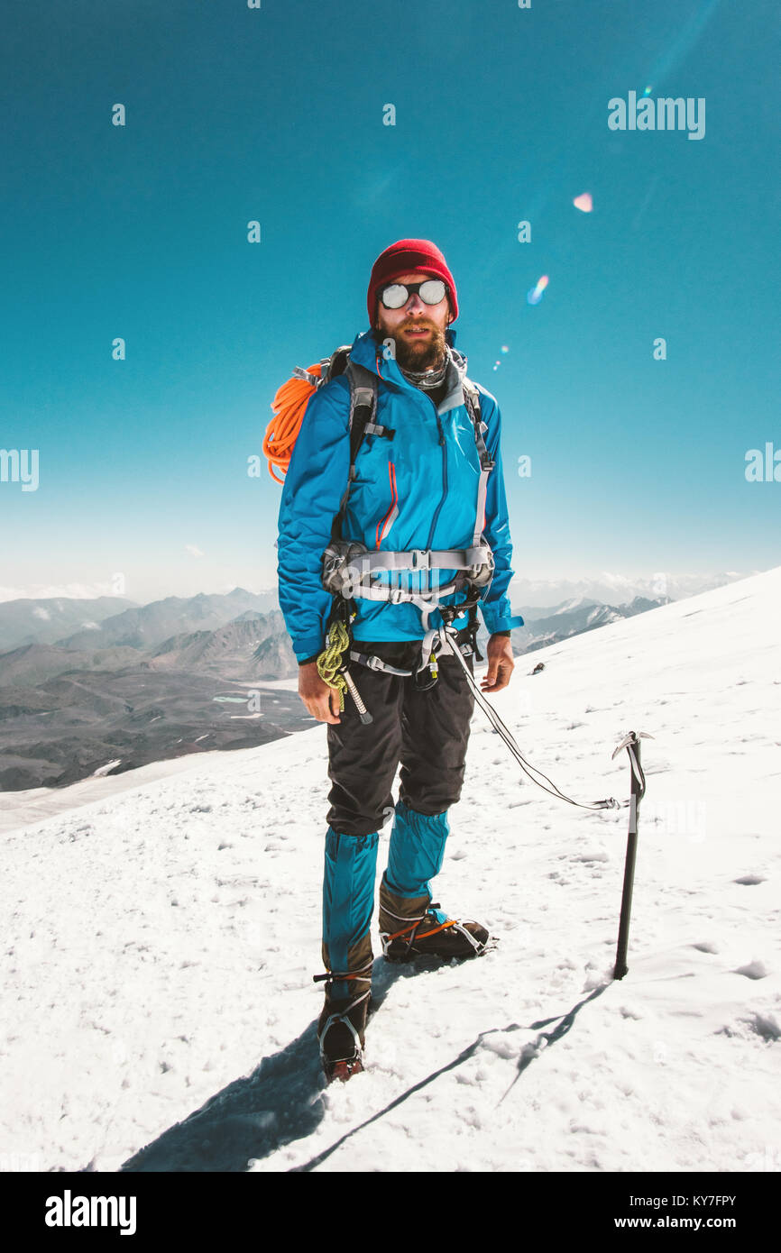 Man alpinist climbing in mountains glacier Travel Lifestyle endurance ...