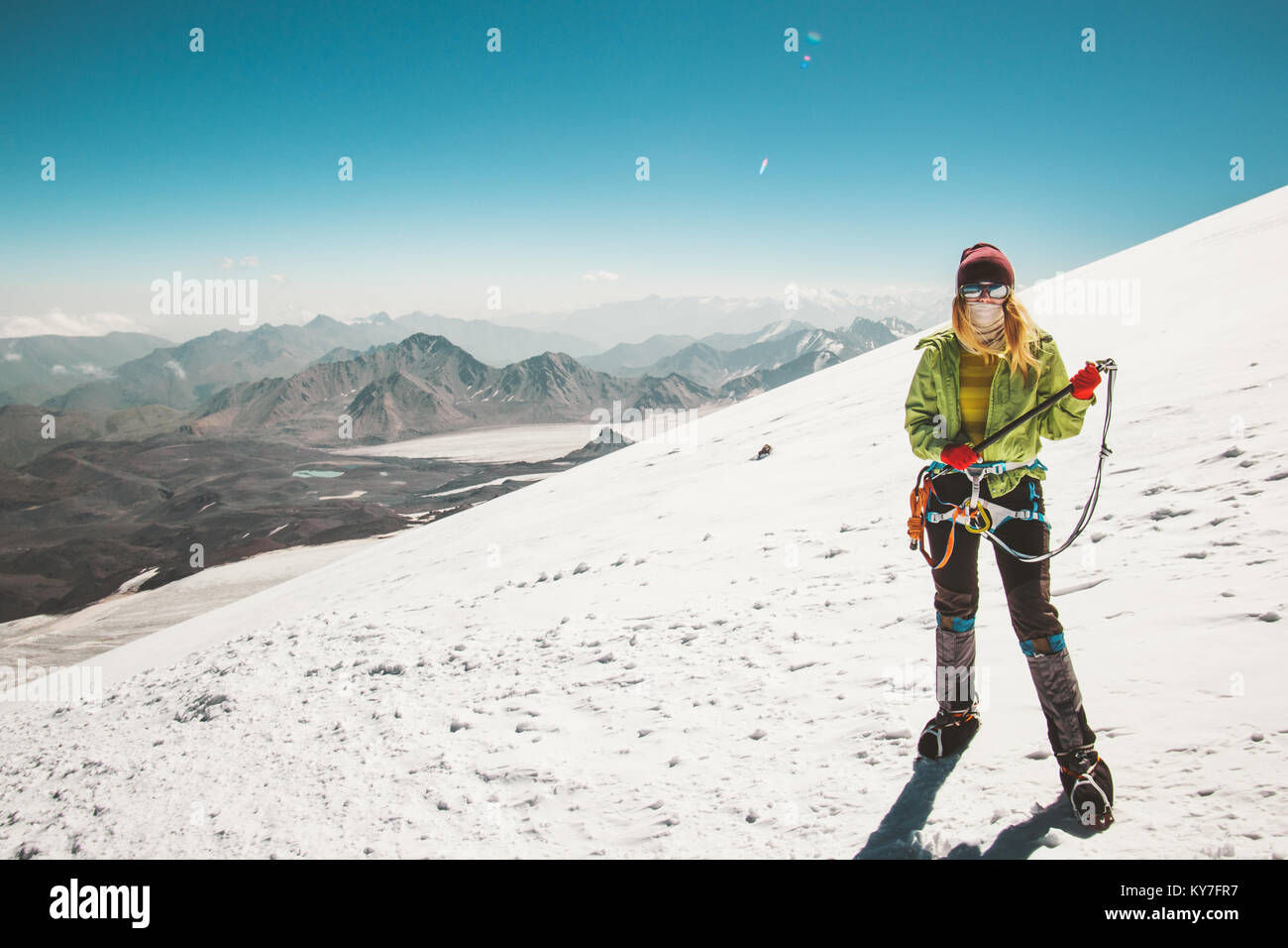 Woman alpinist mountain climbing glacier Travel Lifestyle endurance ...