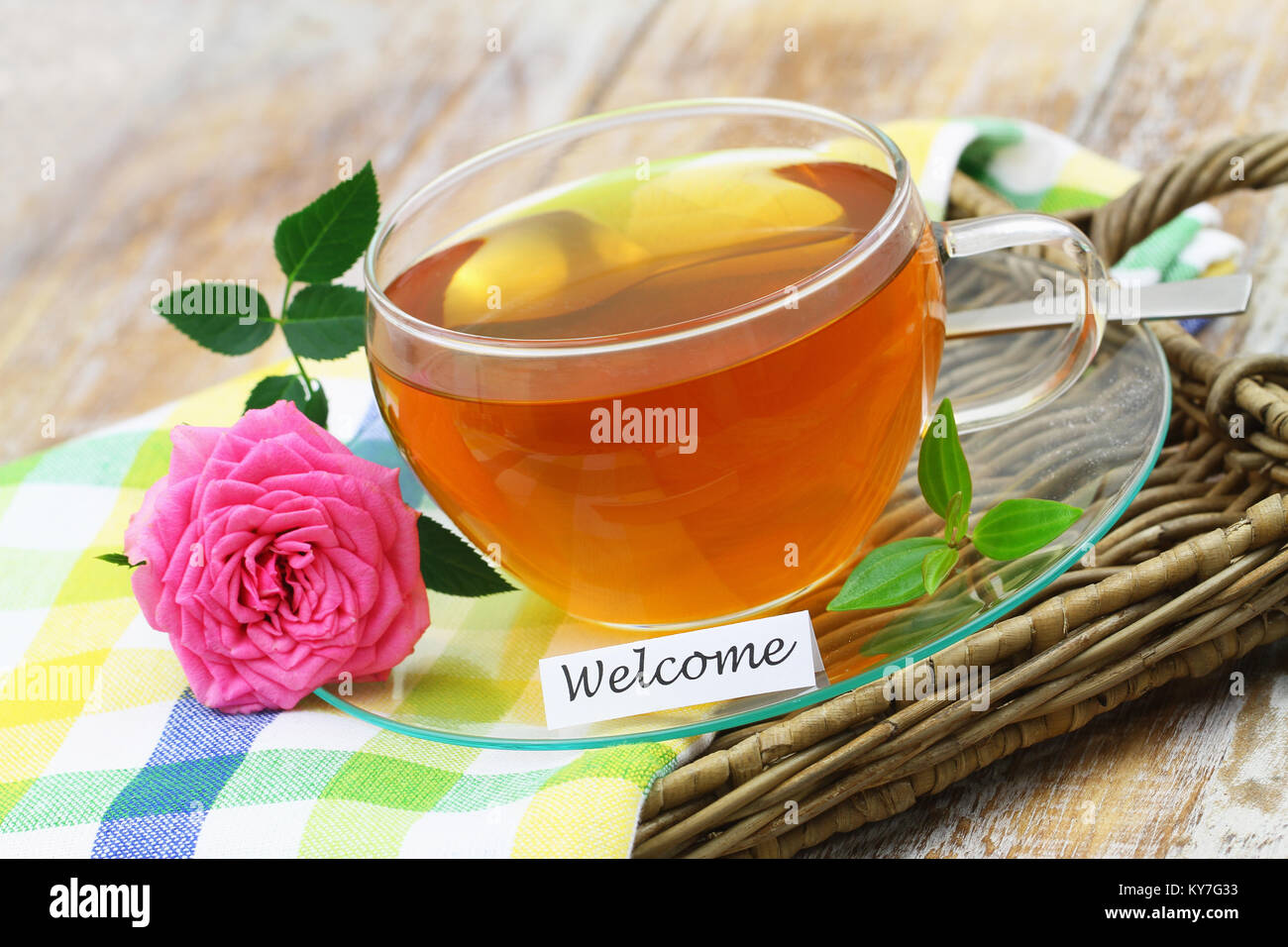 Welcome card with cup of tea and pink rose Stock Photo - Alamy
