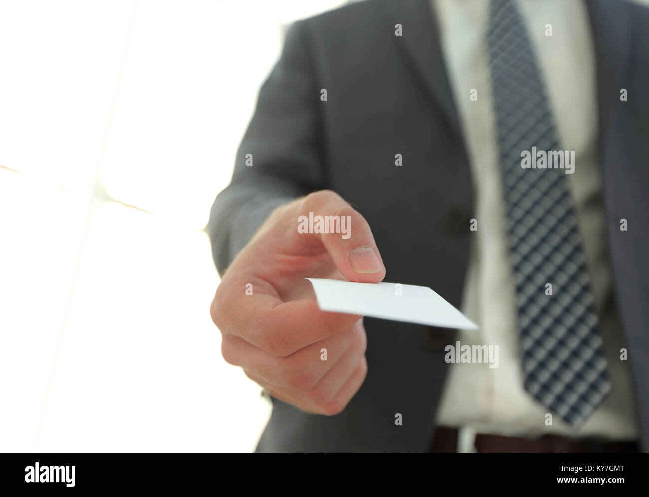 Business man giving business card on bright background Stock Photo - Alamy