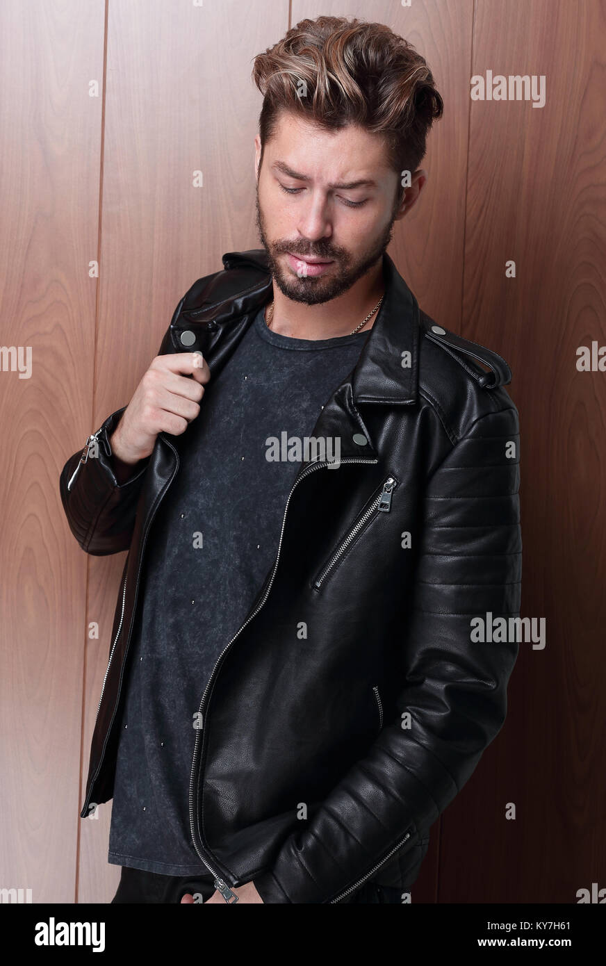 Muscular man in leather jacket hi-res stock photography and images - Alamy