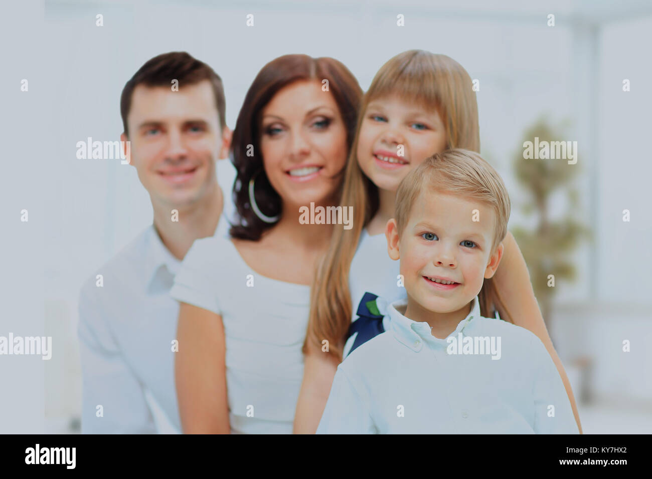 the image of a happy family with smiling son in the foreground Stock ...