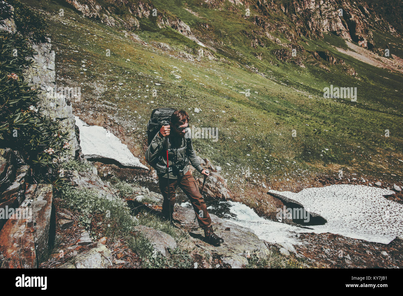 Traveler Man trail running expedition with backpack Travel Lifestyle ...