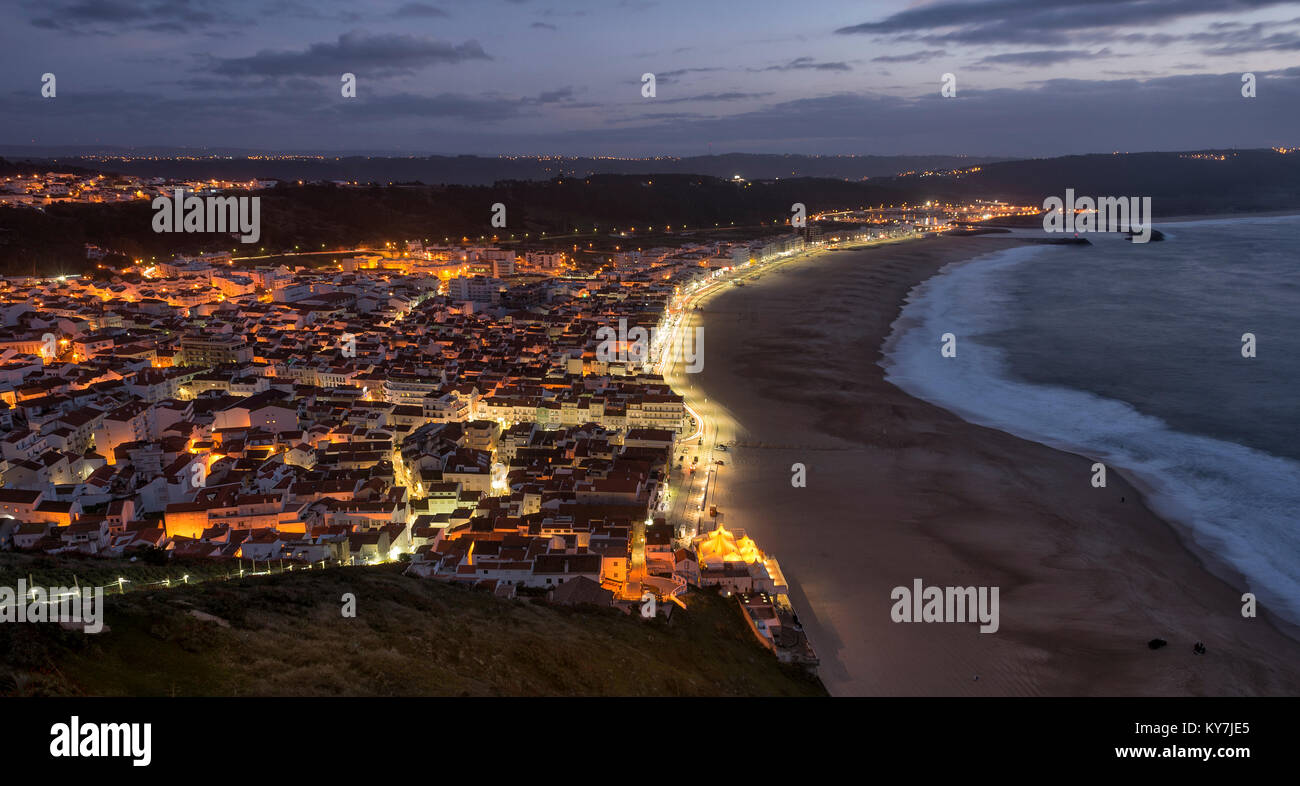 night time view over traditional fishing town of Nazare, Portugal Stock ...