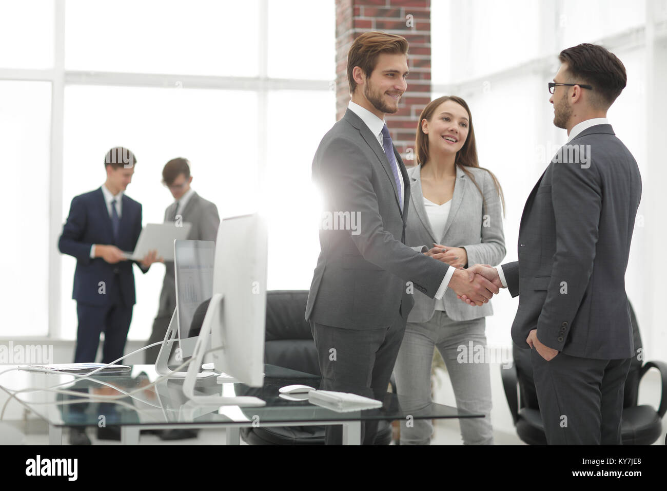 handshake business partners at a meeting Stock Photo - Alamy