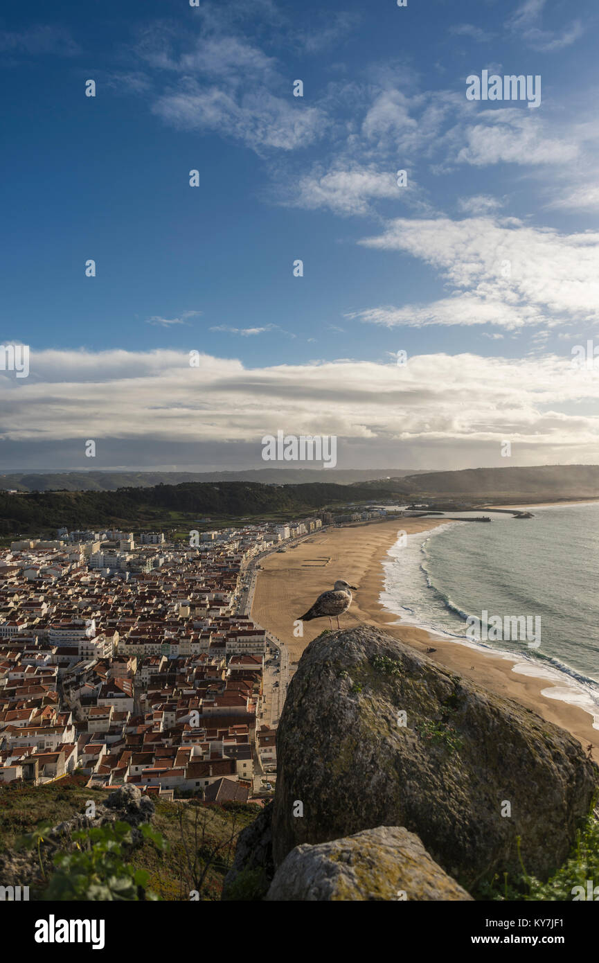 view over traditional fishing town of Nazare from the hill top town of ...