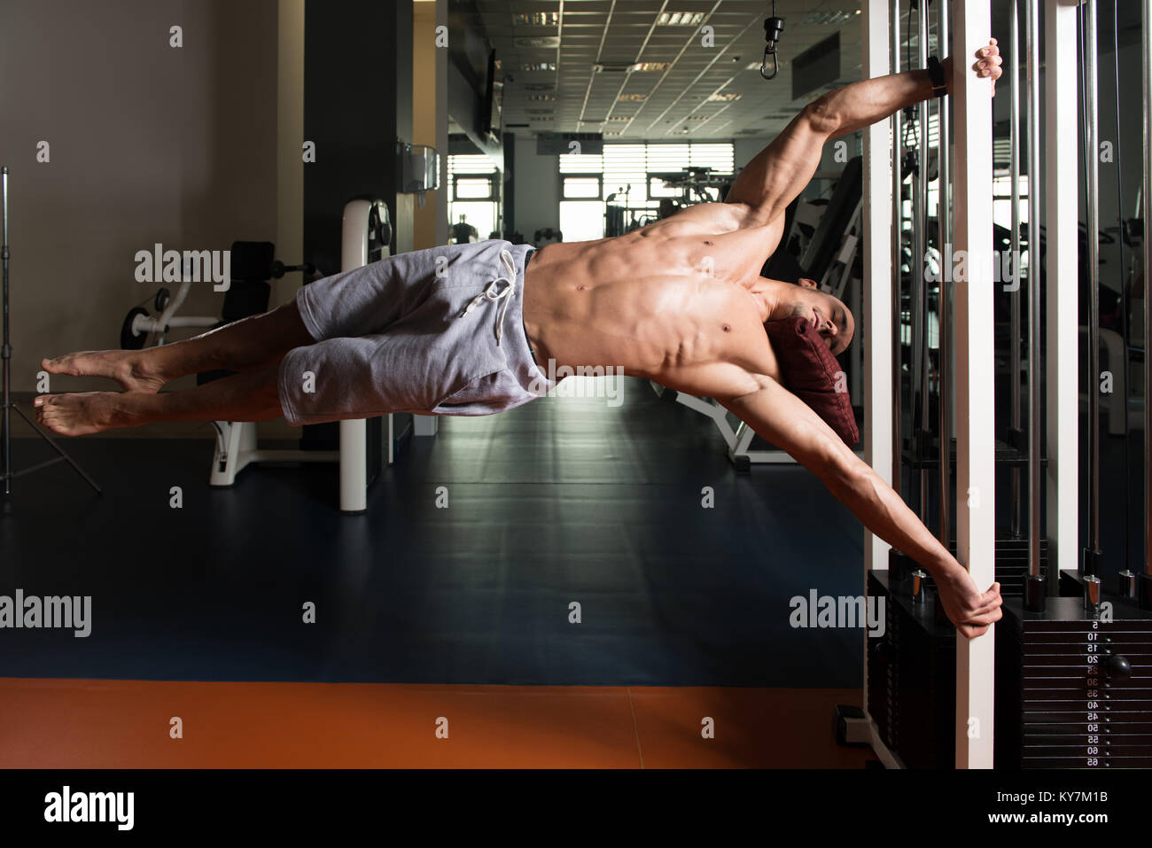 Muscular Man Doing Human Flag Exercise As Part Of Bodybuilding Training ...
