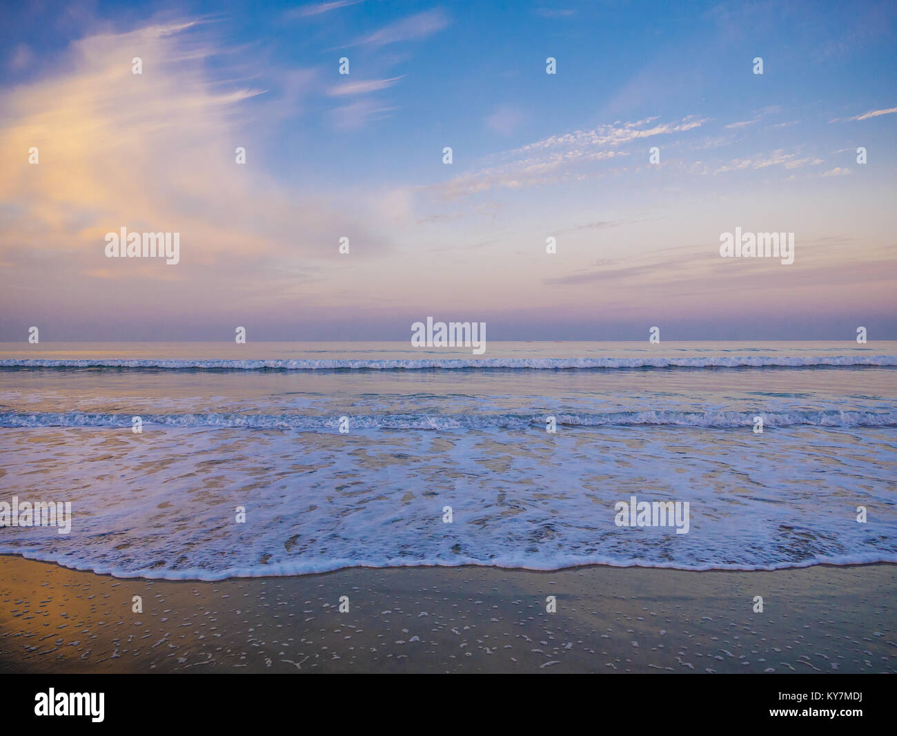sun and Beach with Colorful sky at North Goa, India Stock Photo - Alamy