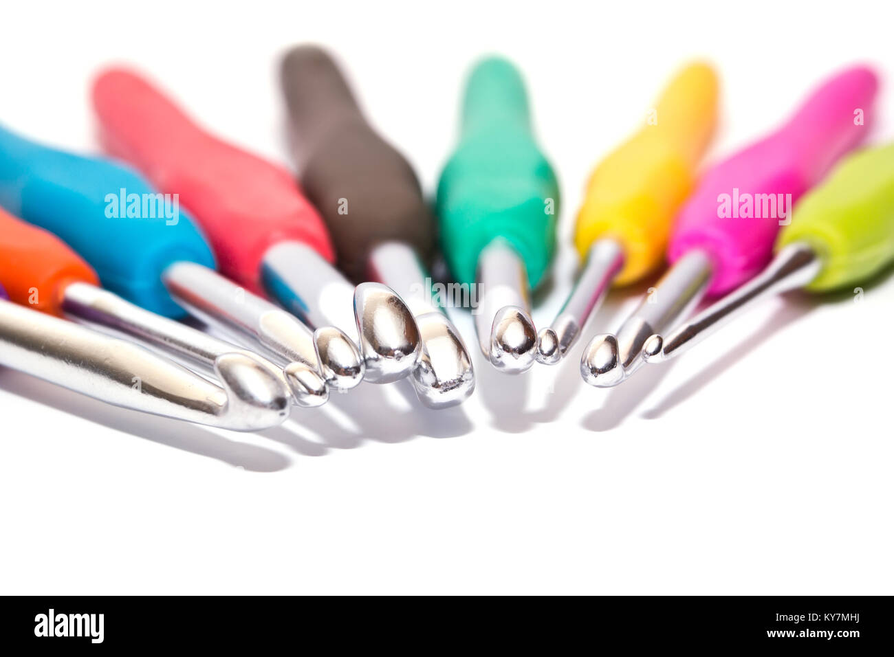 Different size crochet hooks for knitting isolated on white background ...