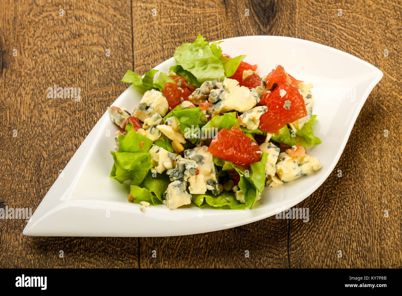 Grapefruit and blue cheese salad with cedar nut Stock Photo - Alamy
