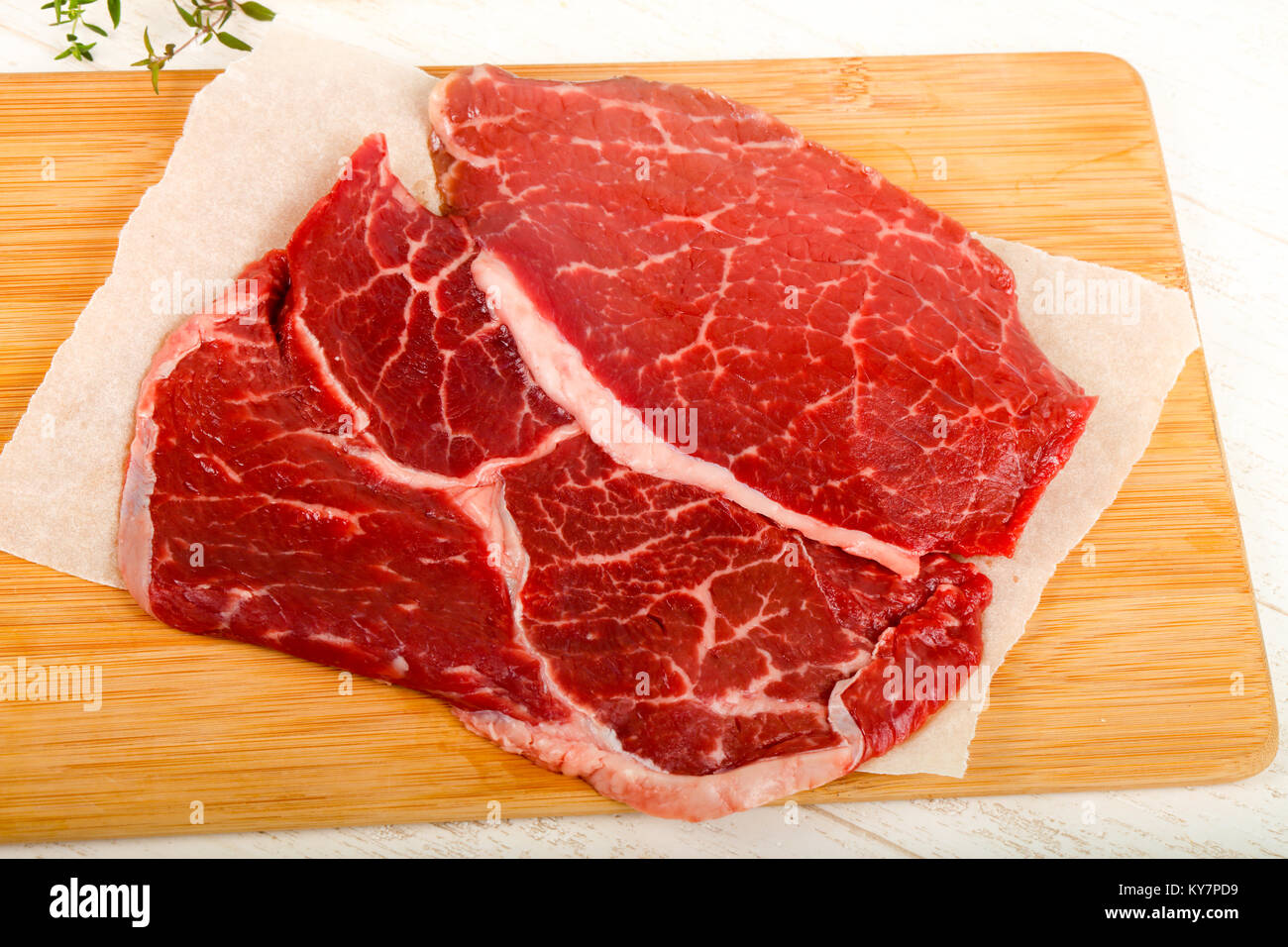 Raw beef steak ready for cooking Stock Photo - Alamy