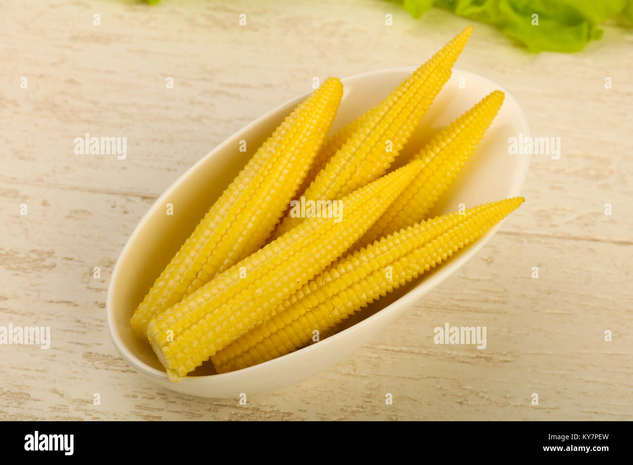 Young raw baby corn Stock Photo - Alamy