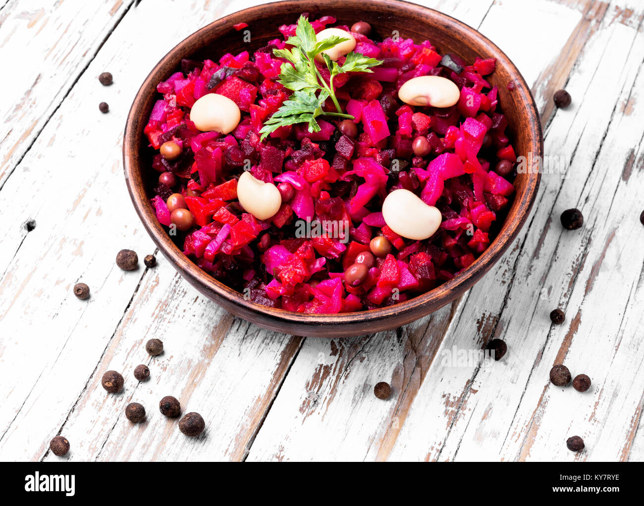 Traditional vegetarian russian beetroot salad vinaigrette in rustic ...